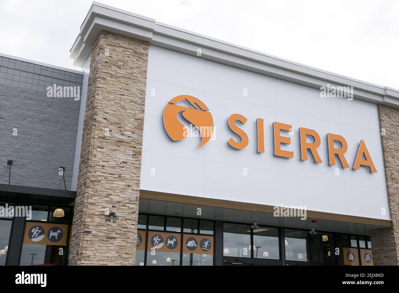 A logo sign outside of a Sierra retail store location in East Hanover ...