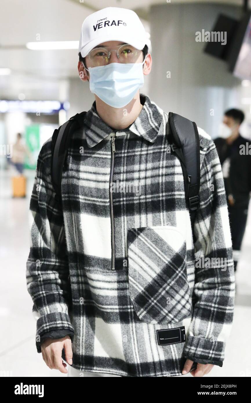 Chinese actor Liu Ruilin arrives at a Beijing airport before departure ...