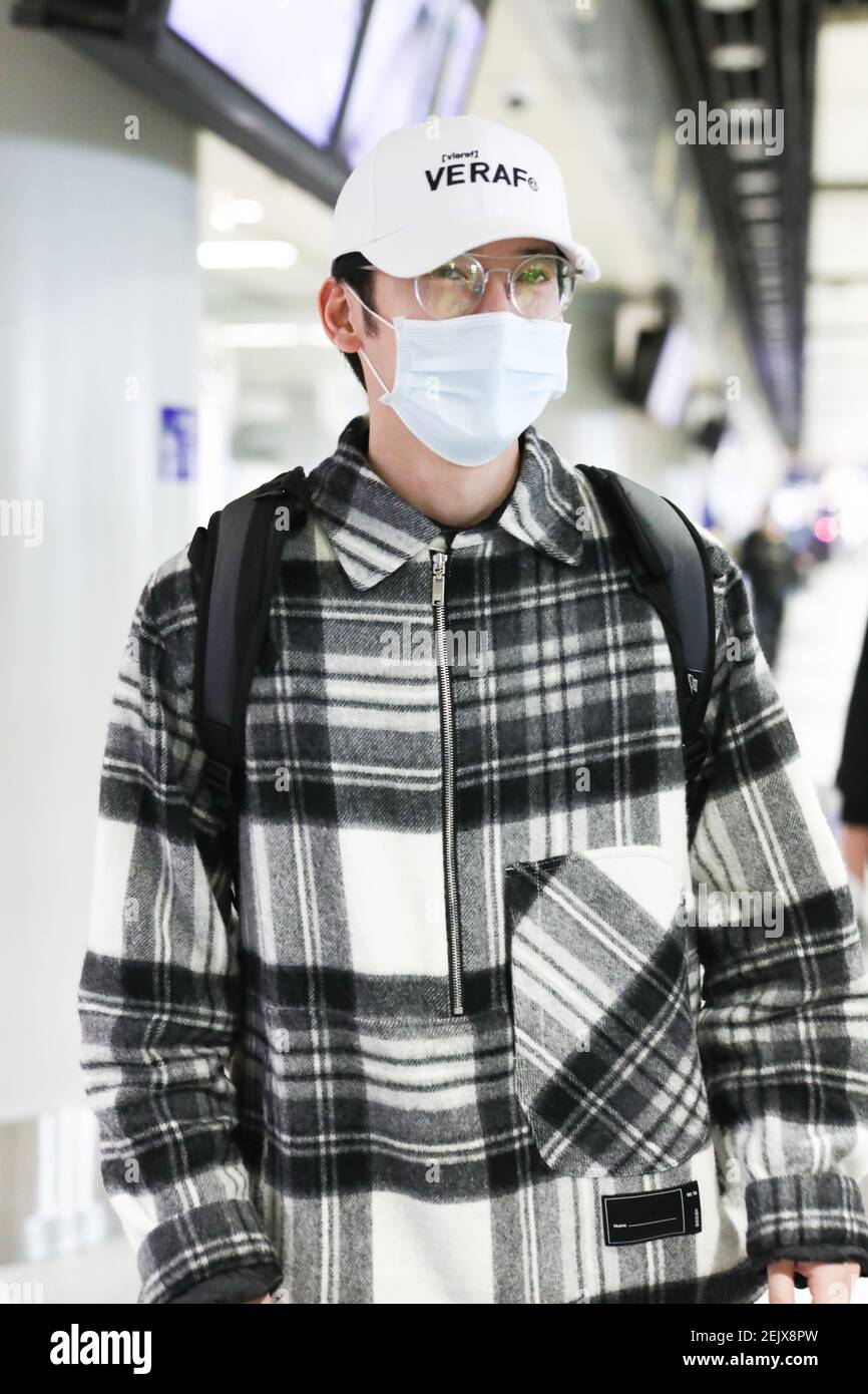 Chinese actor Liu Ruilin arrives at a Beijing airport before departure ...