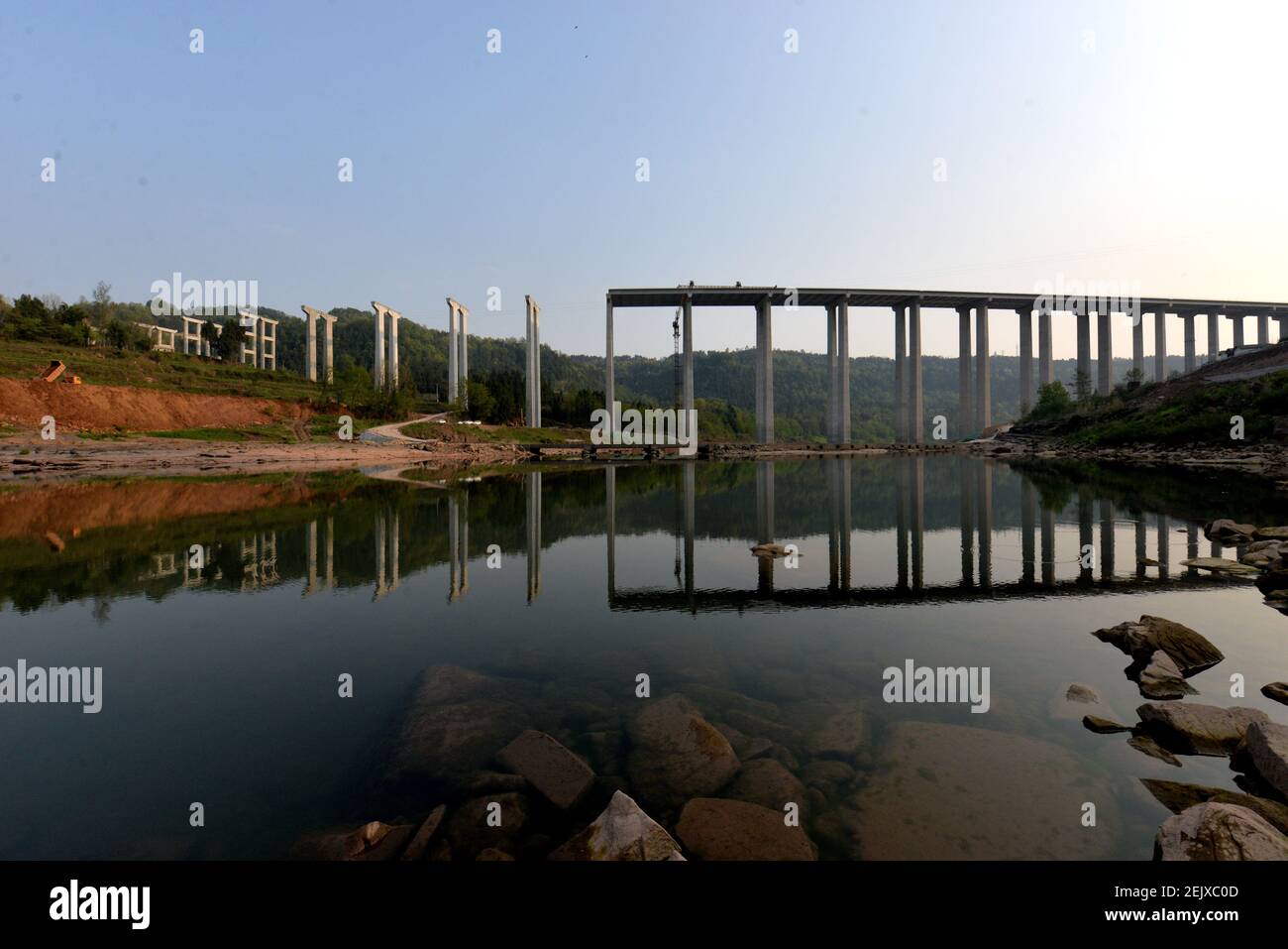 BAZHONG, CHINA - MARCH 25, 2020 - Workers step up construction on the ...