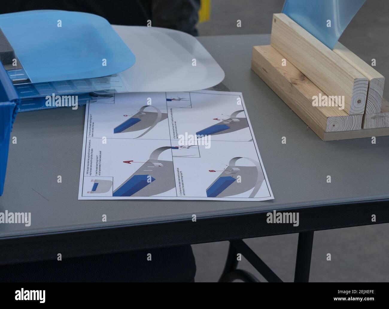 View of instruction on how to manufacture facial shields at Duggal ...