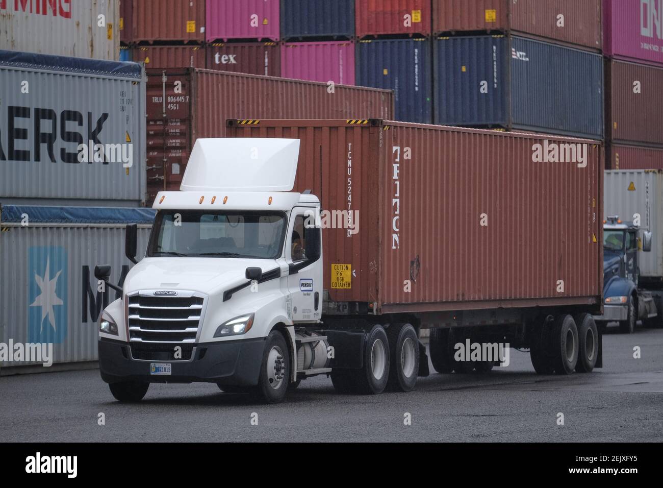 A container truck leaves the Northwest Container Services facility in ...