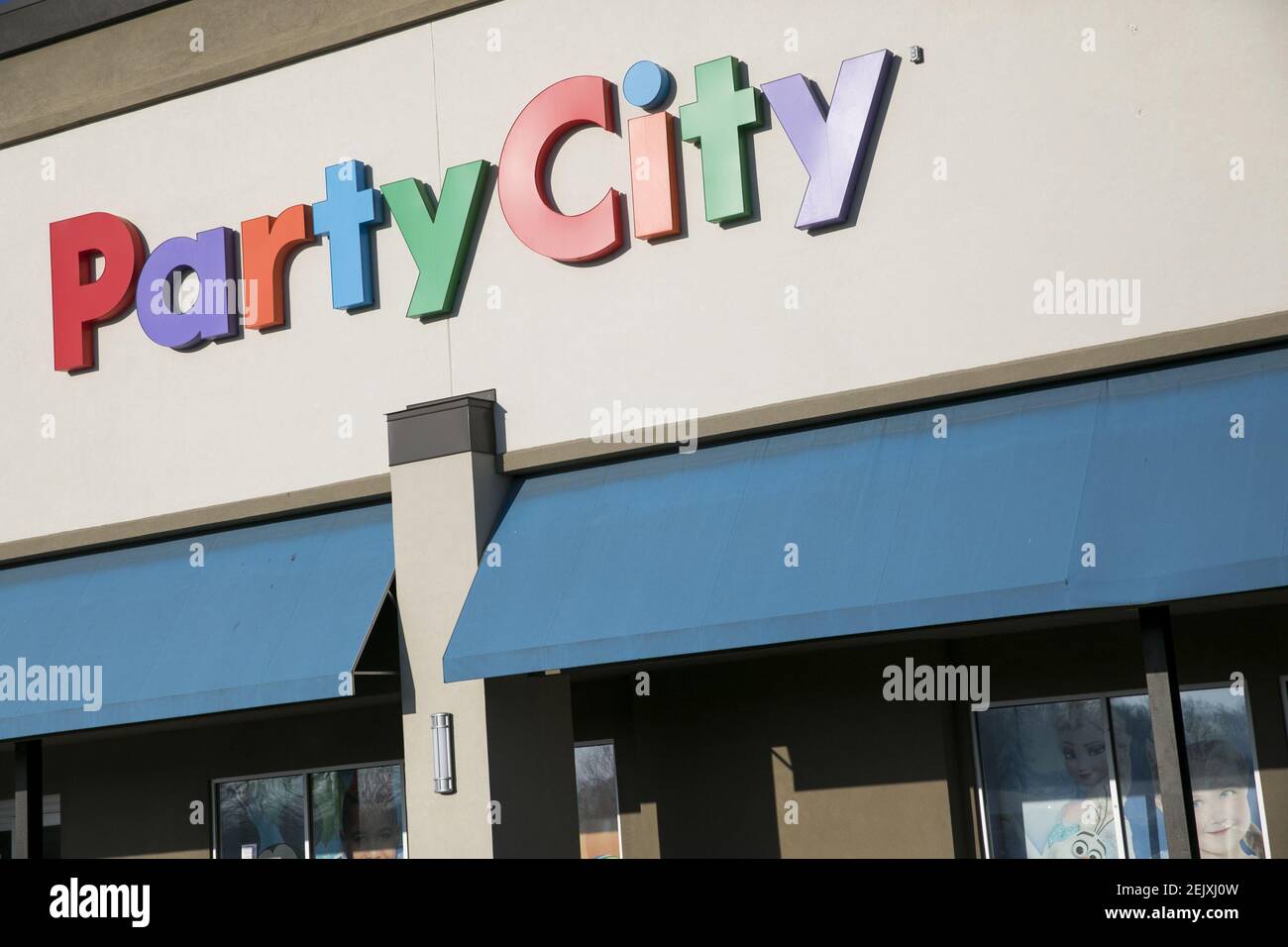A logo sign outside of a Party City retail store location in Bel Air ...