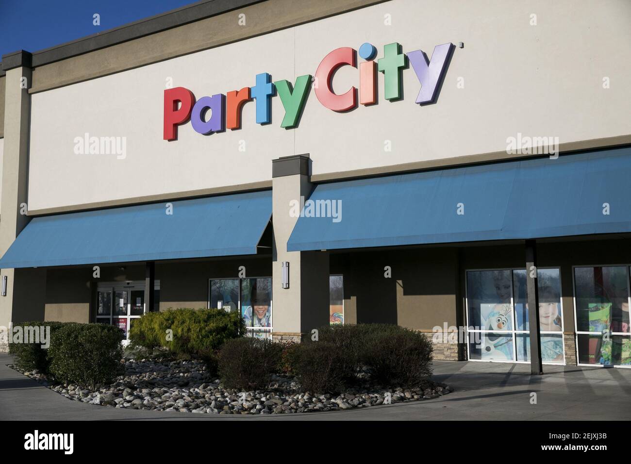 A logo sign outside of a Party City retail store location in Bel Air ...