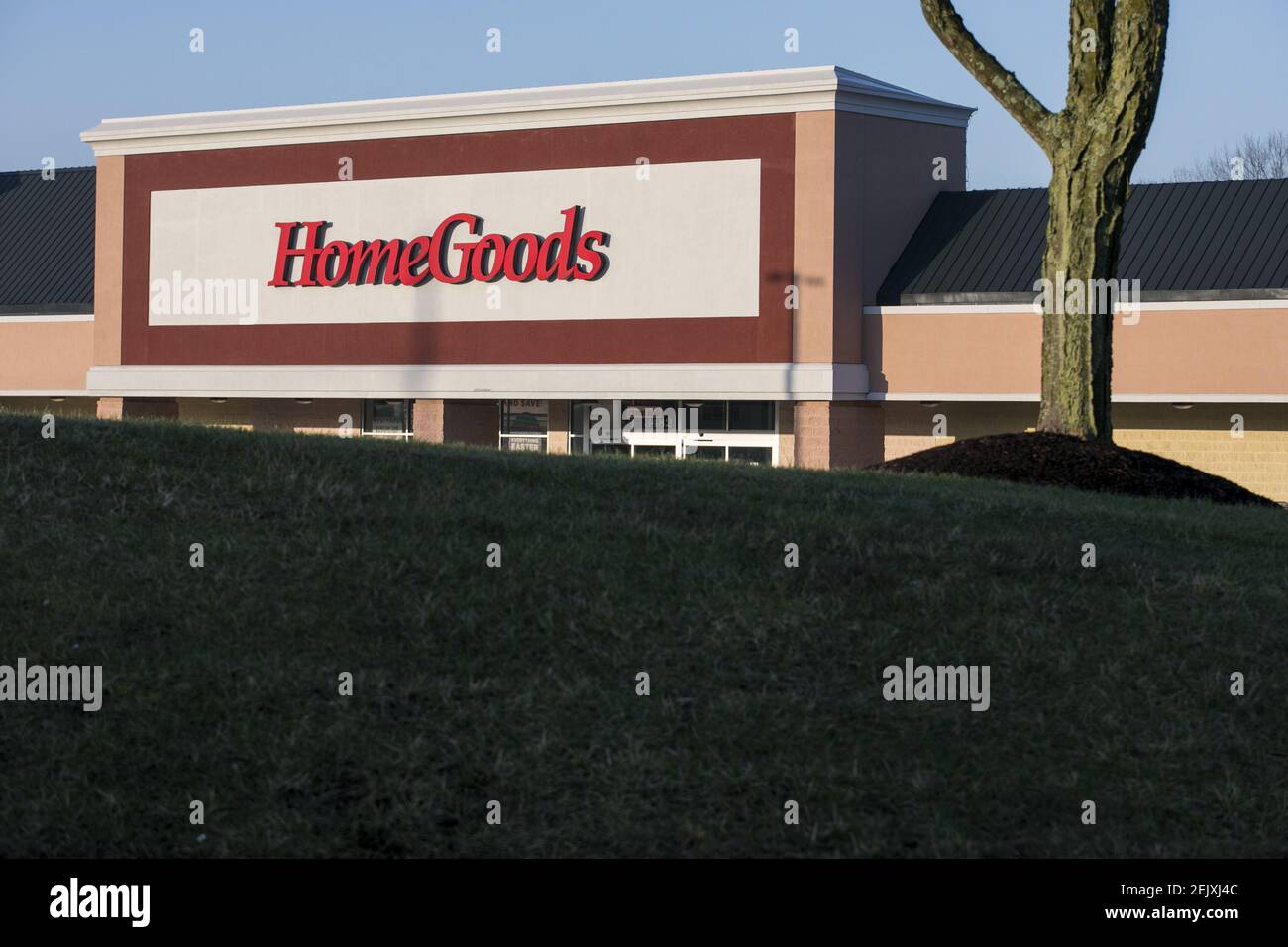 A logo sign outside of a HomeGoods retail store location in Abingdon ...