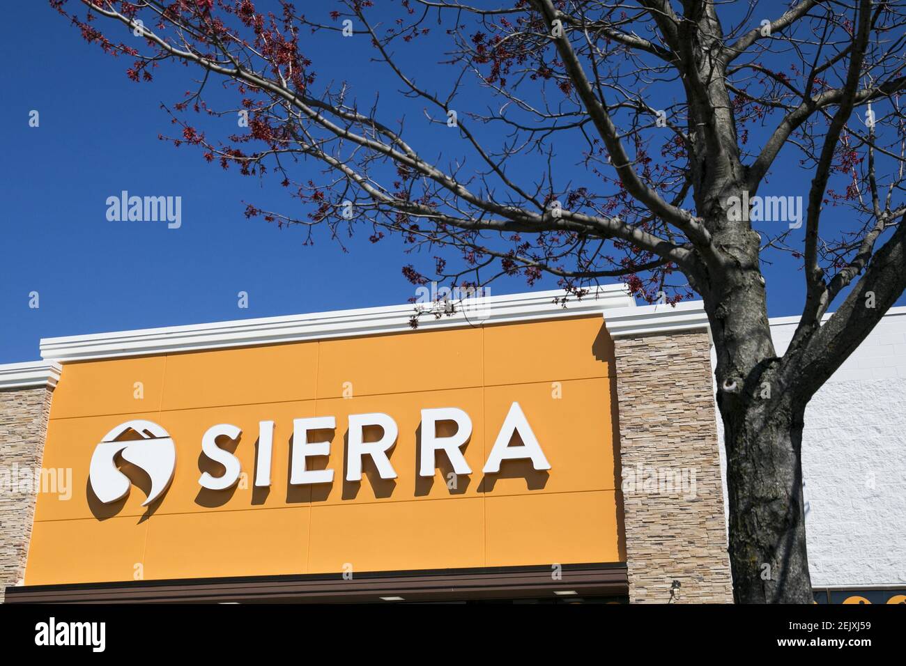 A logo sign outside of a Sierra retail store location in Frederick ...