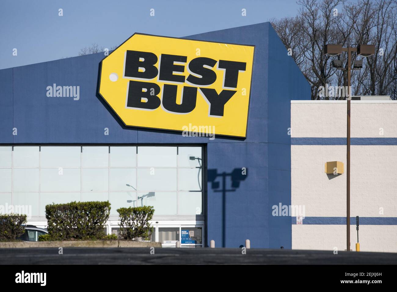 A logo sign outside of a Best Buy retail store location in Bel Air ...