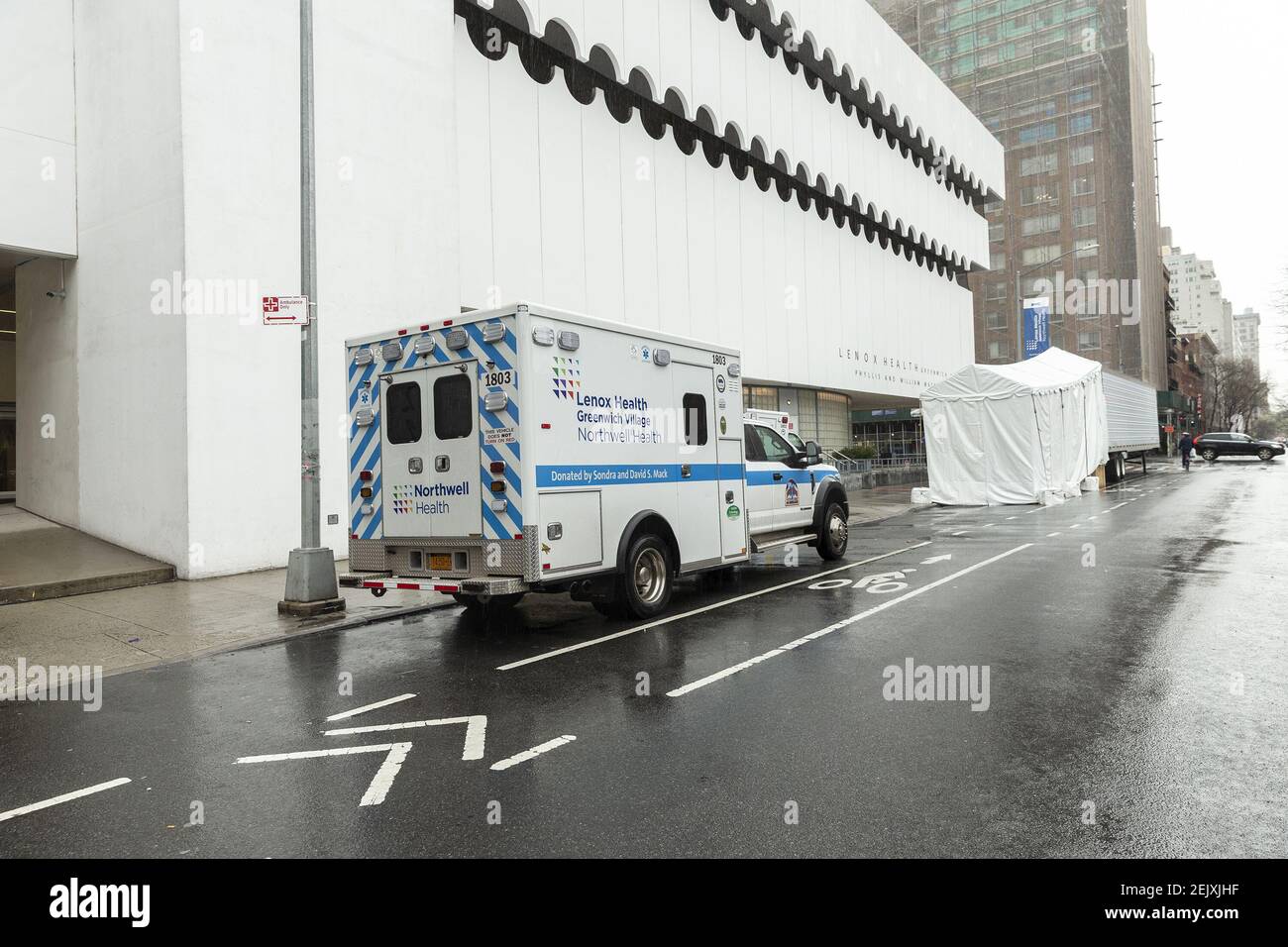 Medical emergency vehicle & makeshift morgue trailer parked next to ...
