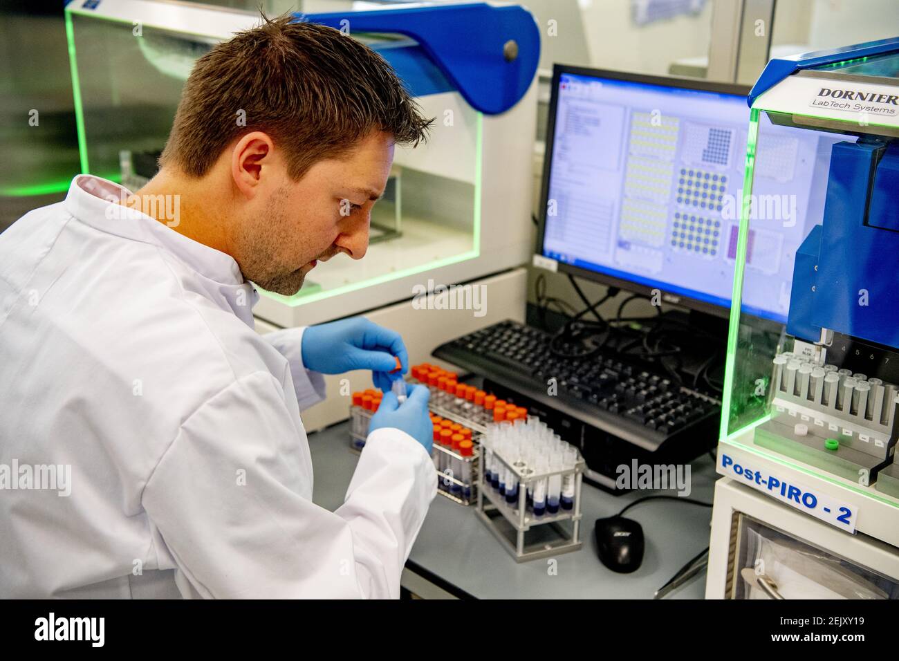 A lab technician carrying out tests for COVID-19 coronavirus in the ...