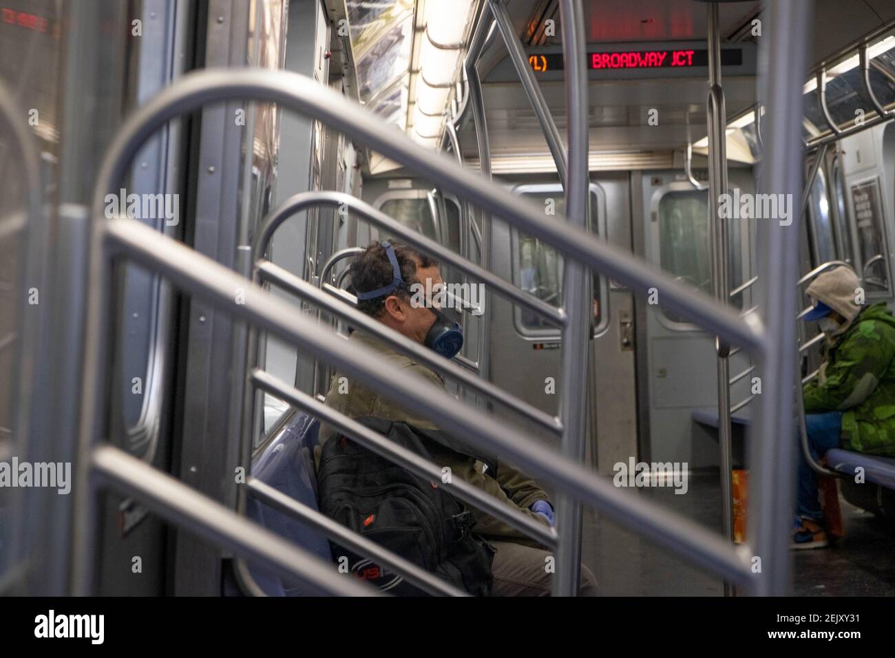 A man wearing a gas mask in the New York City subway amid the ...