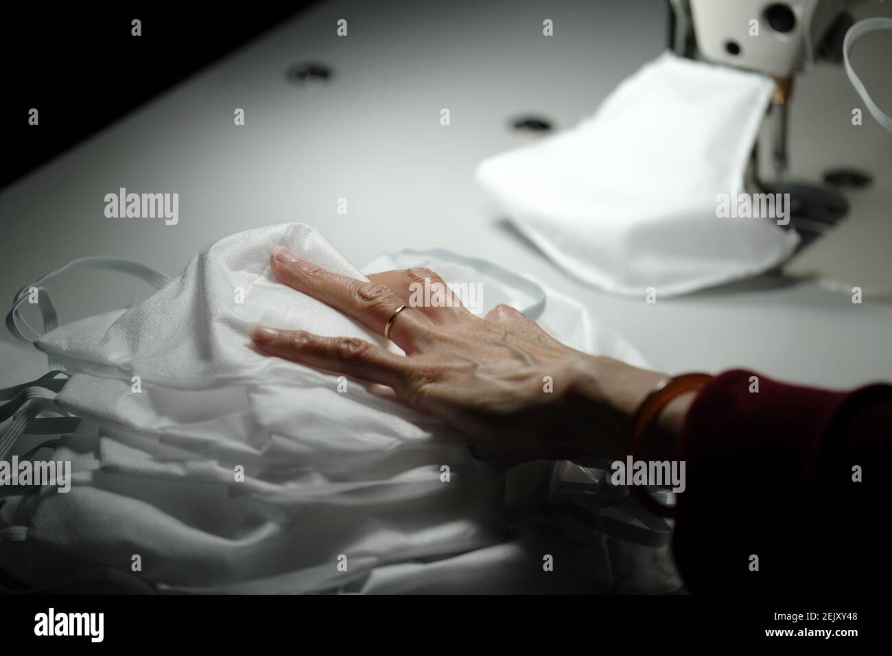 A worker makes face masks at the Portland Garment Factory in Portland ...