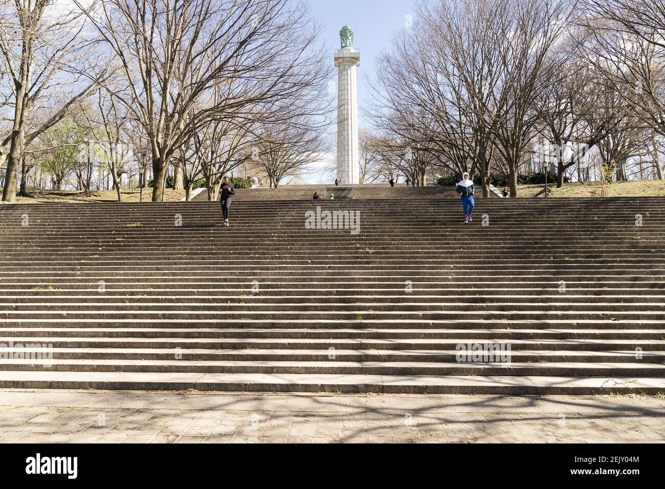 People exercise on steps keepeing social distances due to COVID-19 ...