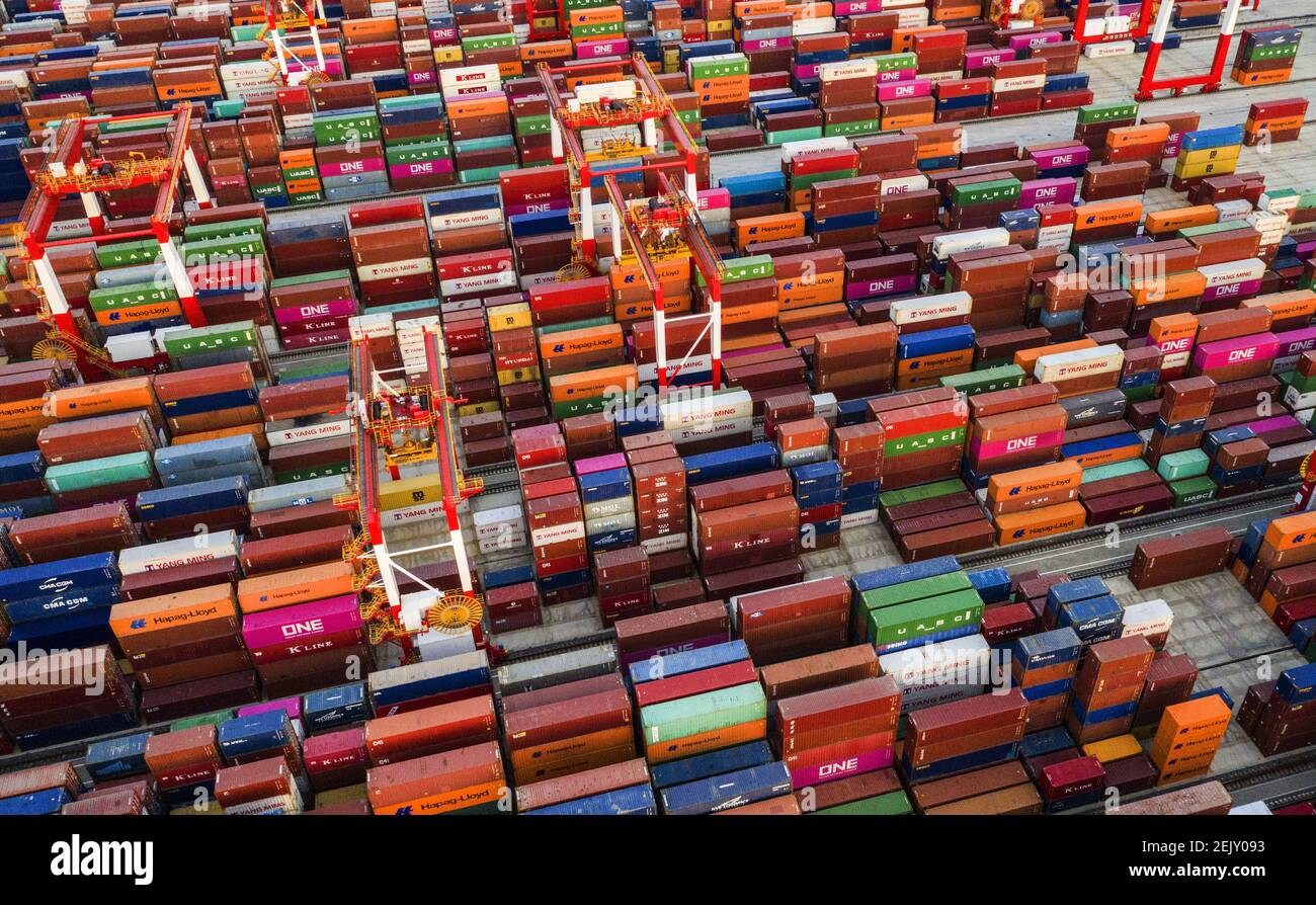 An aerial view of containers piled up at Yangshan Port, a deep water ...