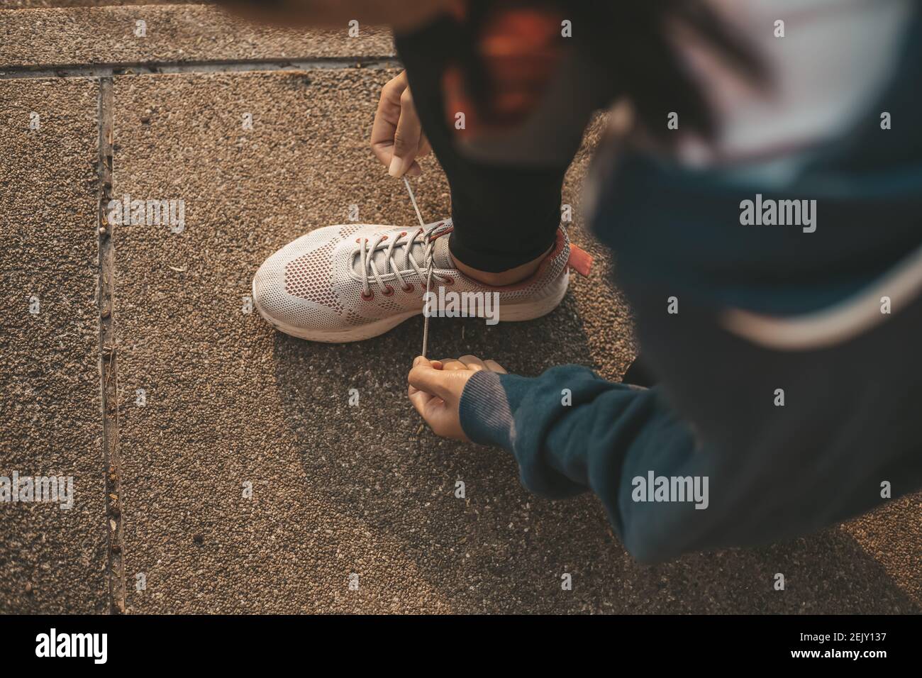 Tying Shoe Laces High Resolution Stock Photography and Images - Alamy