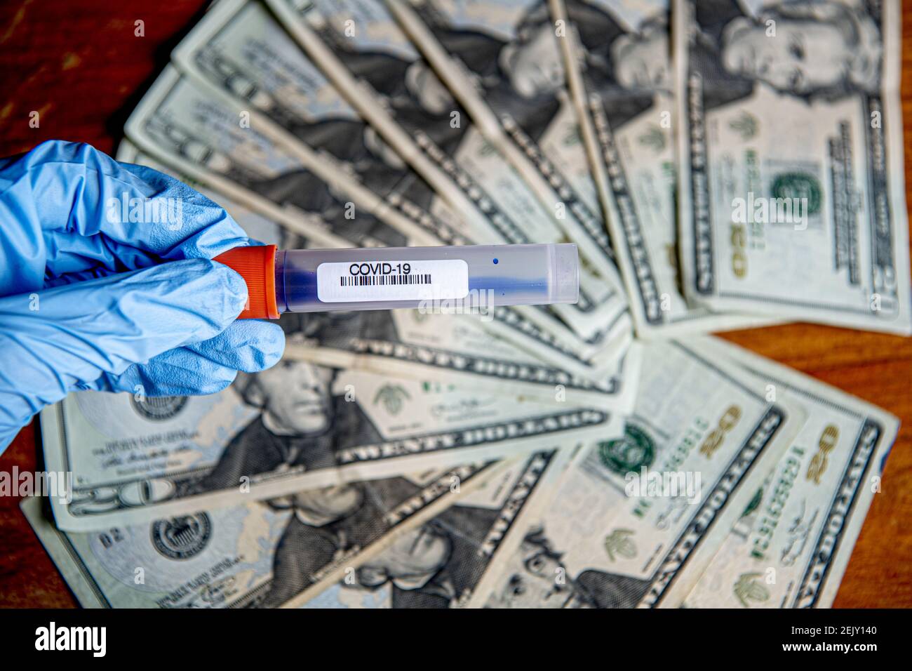 In this photo illustration a latex test tube for the Covid-19 ...