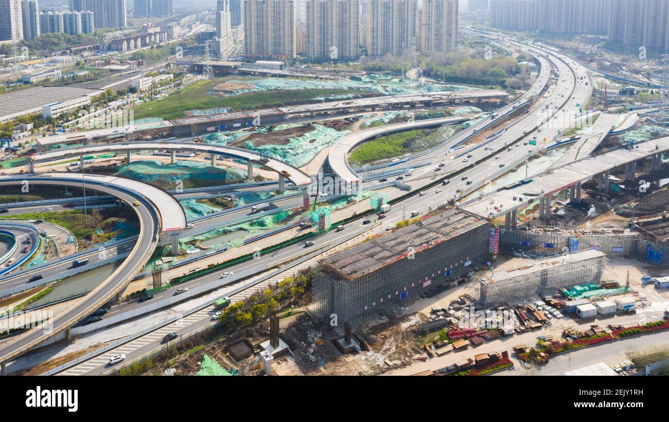 An aerial view of workers busy at the construction site to build the to ...