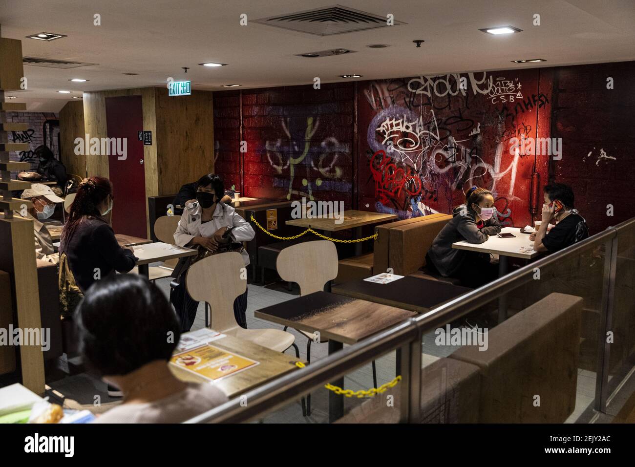 Customers seat at a social distance in a restaurant during the corona ...