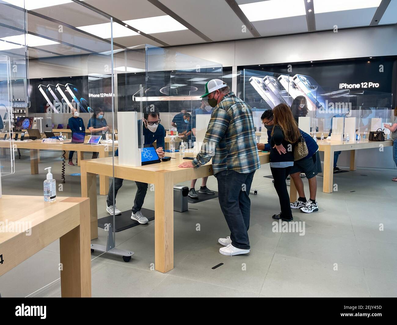 Orlando, FL USA - February 5, 2021: Apple employees waiting on ...