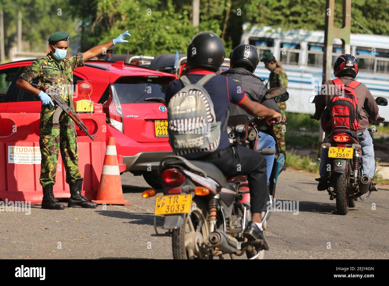 Sri Lankan police Special Task Force officers at a checkpoint enforcing ...