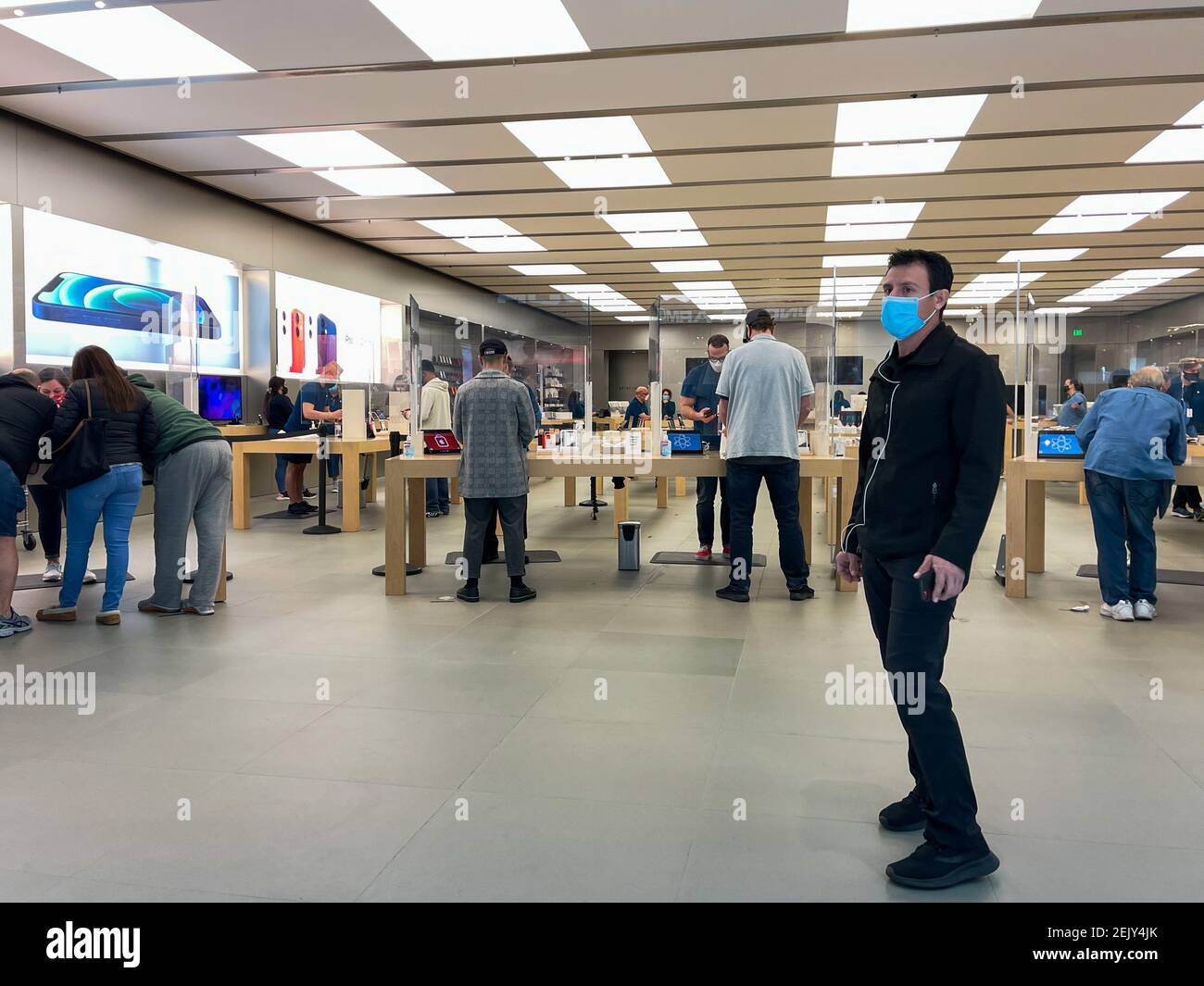 Orlando, FL USA - February 5, 2021: Apple employees waiting on ...