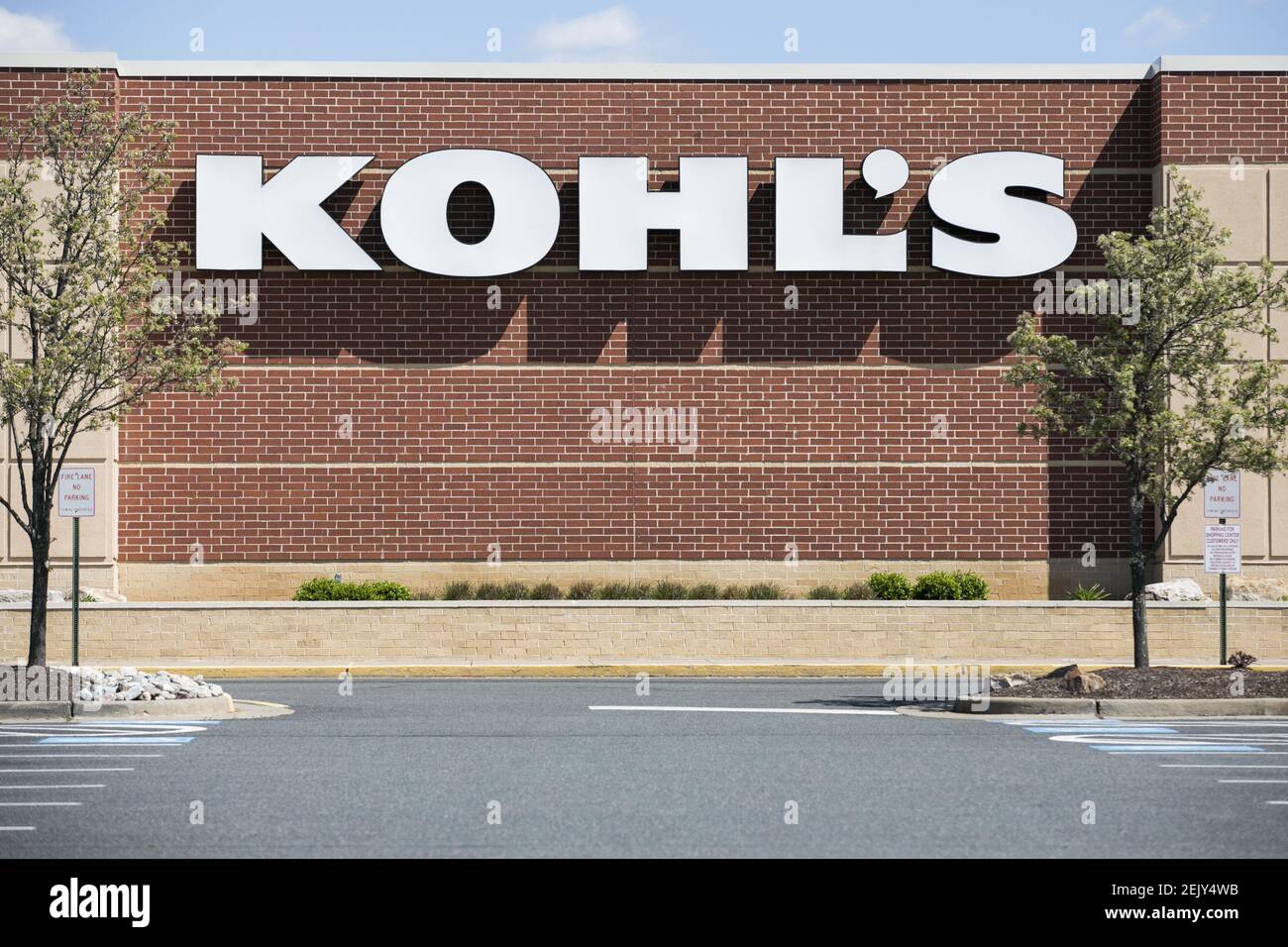 A logo sign outside of a Kohl's retail store location in Stafford ...