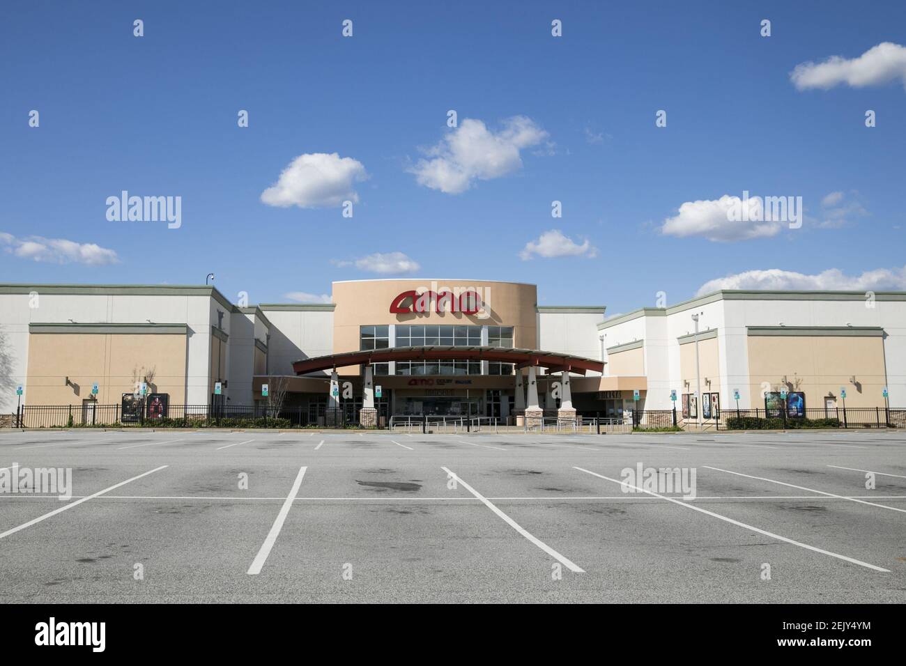A logo sign outside of a AMC Theatres location in Woodbridge, Virginia ...