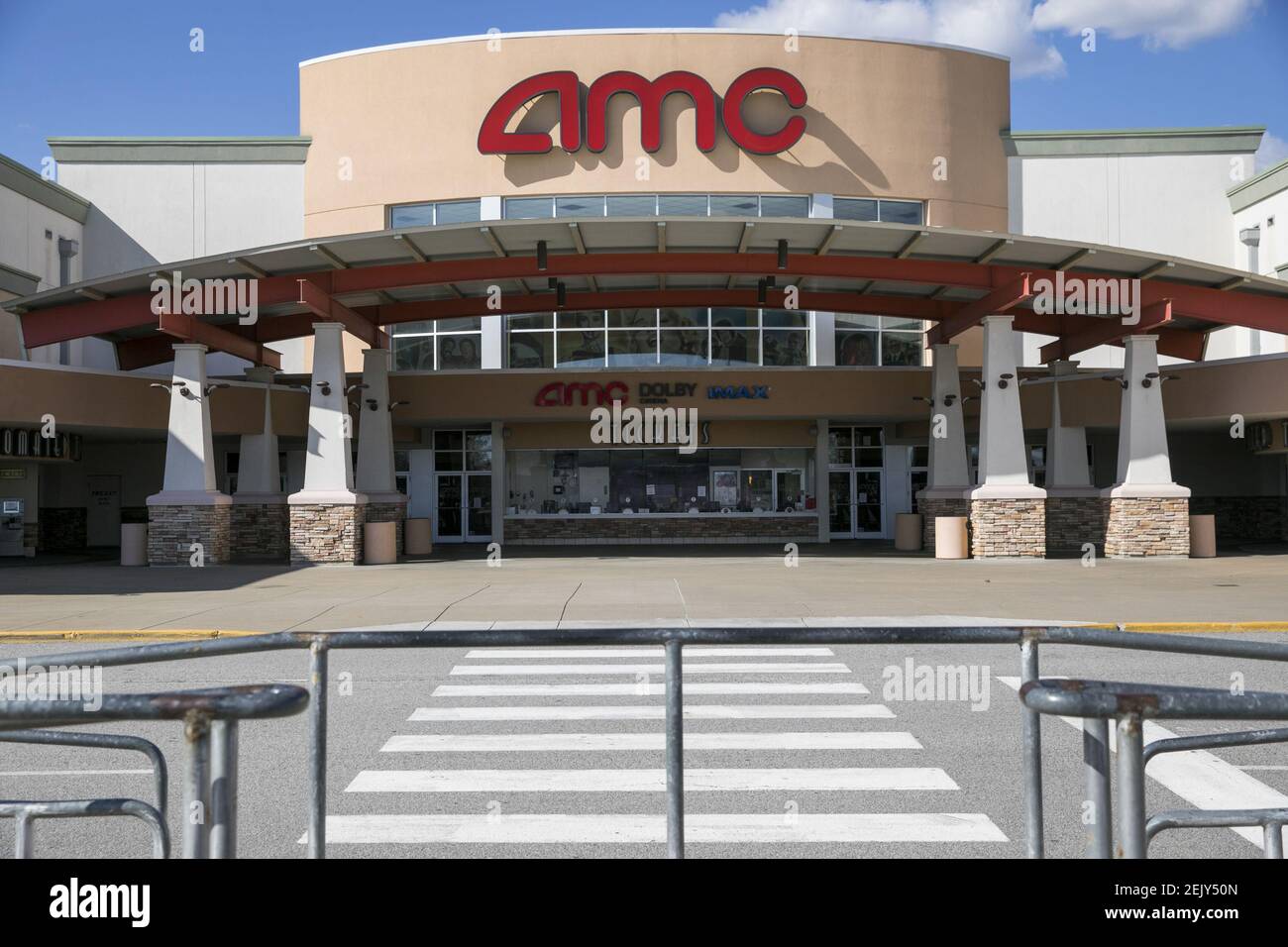 A logo sign outside of a AMC Theatres location in Woodbridge, Virginia ...