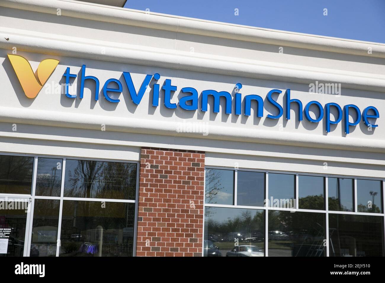 A logo sign outside of a The Vitamin Shoppe retail store location in ...