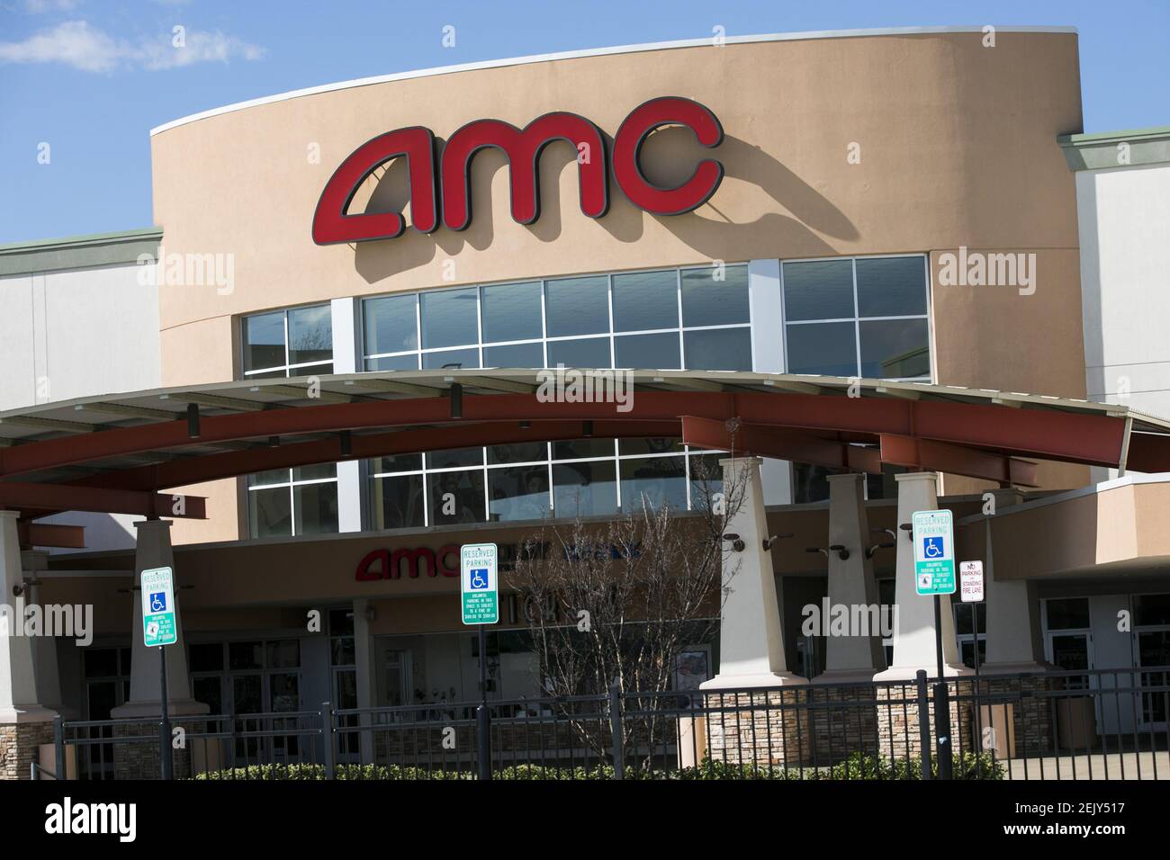 A logo sign outside of a AMC Theatres location in Woodbridge, Virginia ...