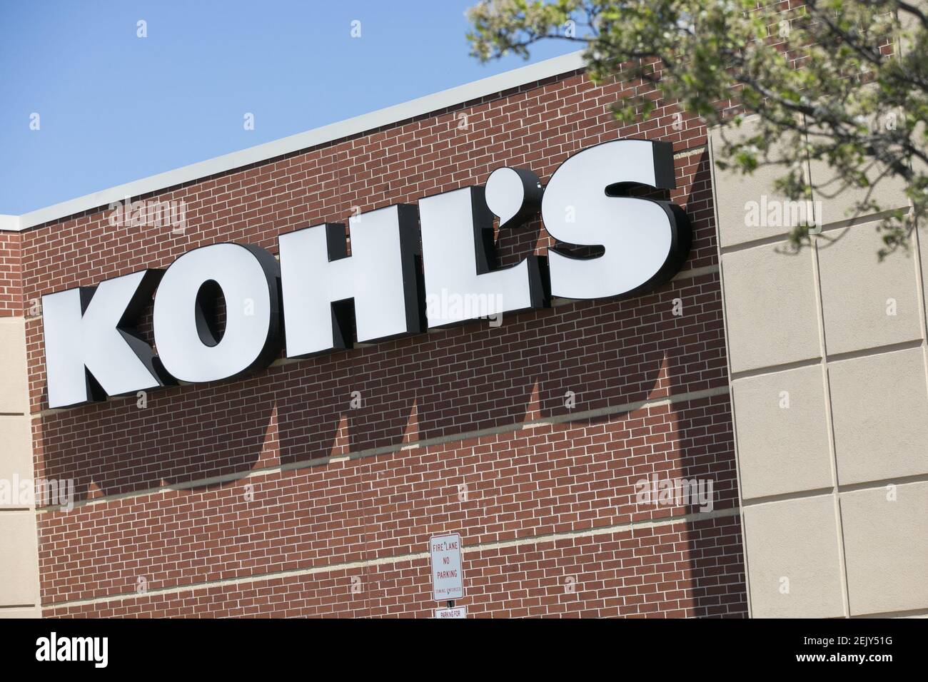 A logo sign outside of a Kohl's retail store location in Stafford ...