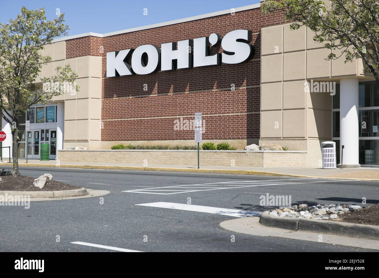 A logo sign outside of a Kohl's retail store location in Stafford ...