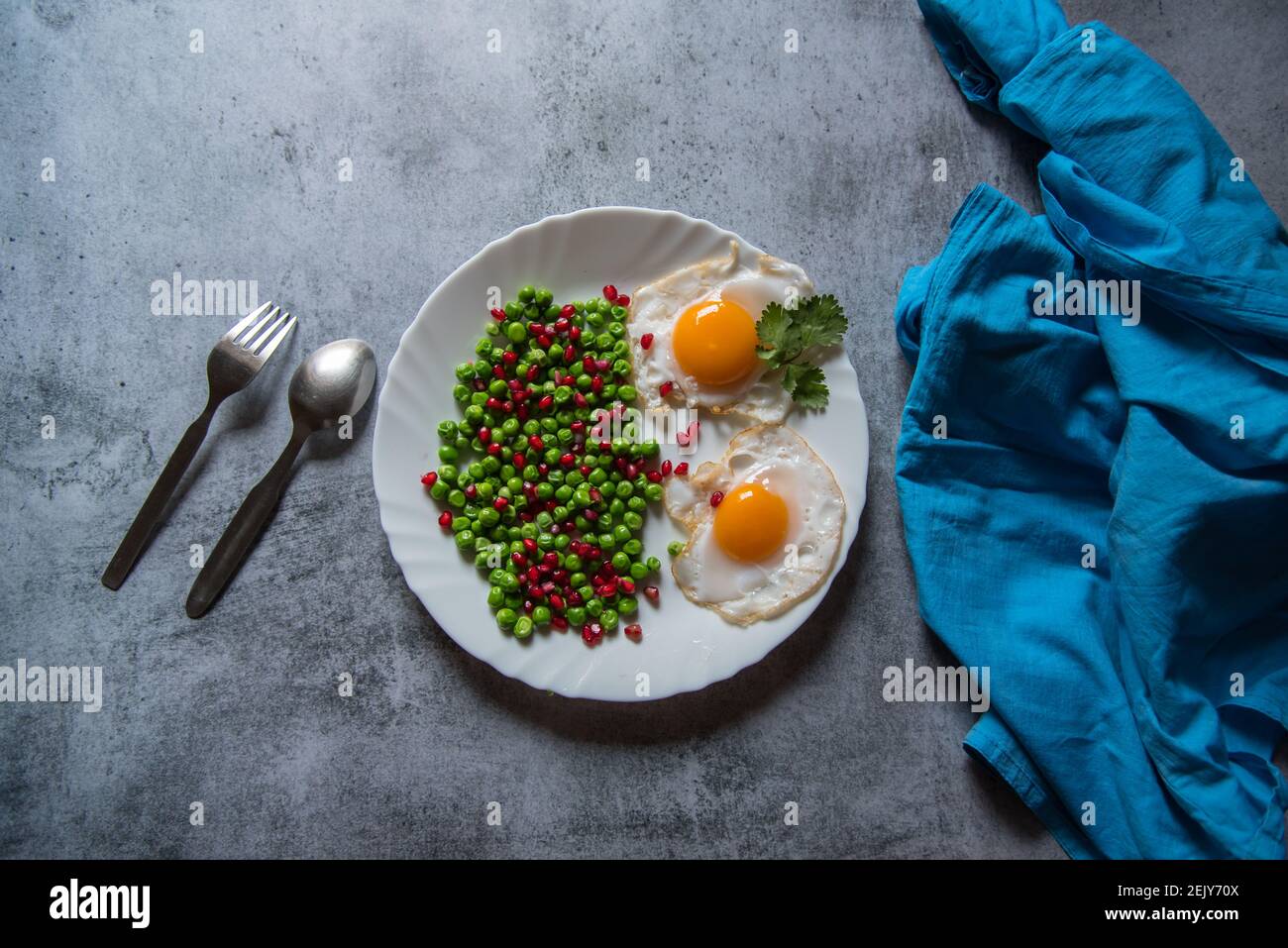 Poached eggs and freshly steamed vegetables in a plate Stock Photo - Alamy