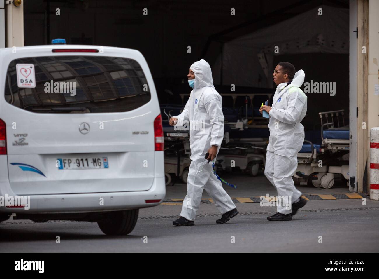 Two paramedics in the emergency room entrance at Lariboisiere Hospital ...