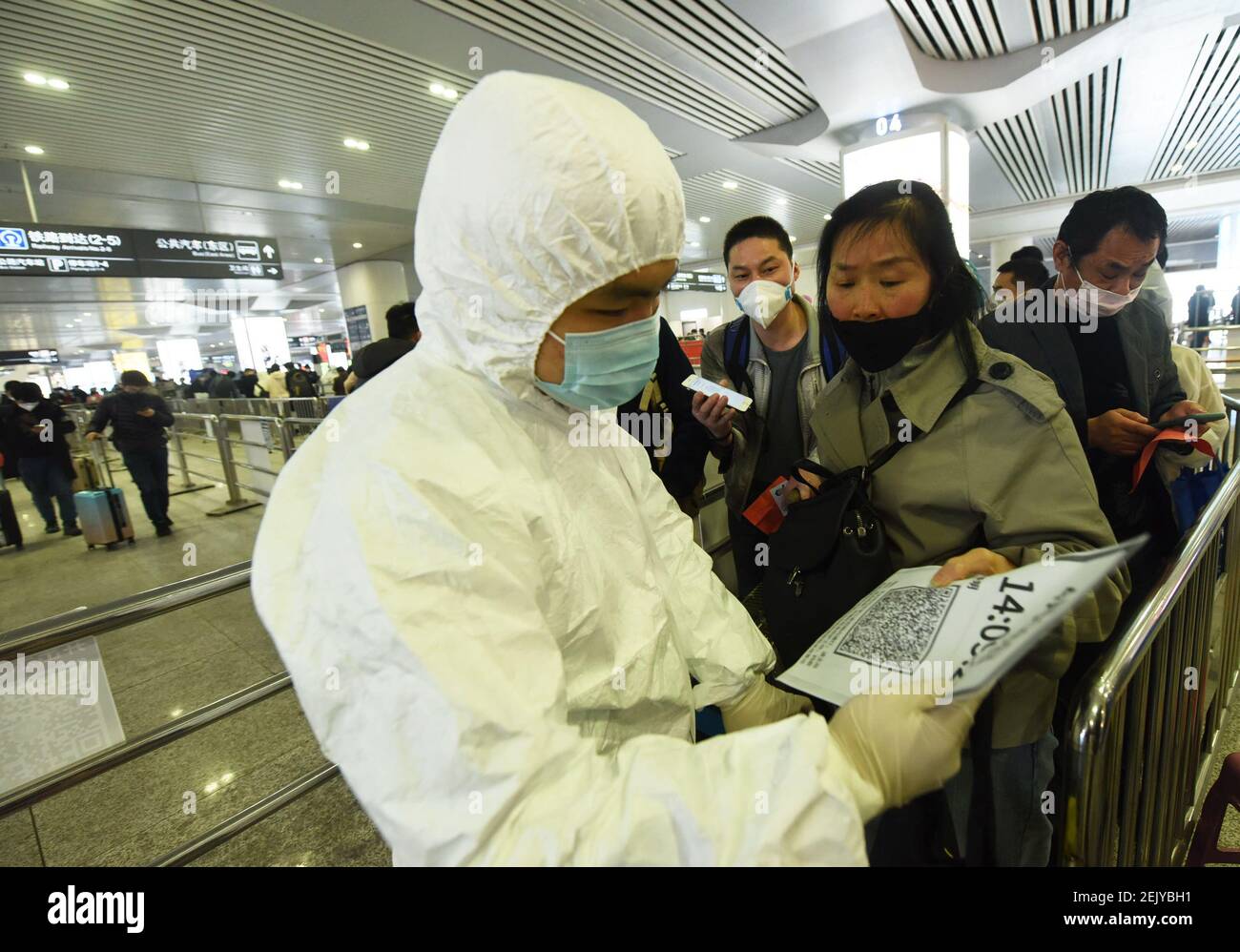 HANGZHOU, CHINA - APRIL 8, 2020 - Staff check the health code and ID ...
