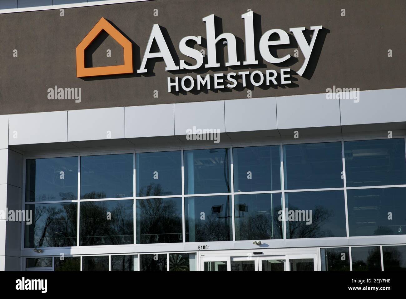 A logo sign outside of a Ashley HomeStore retail store location in ...