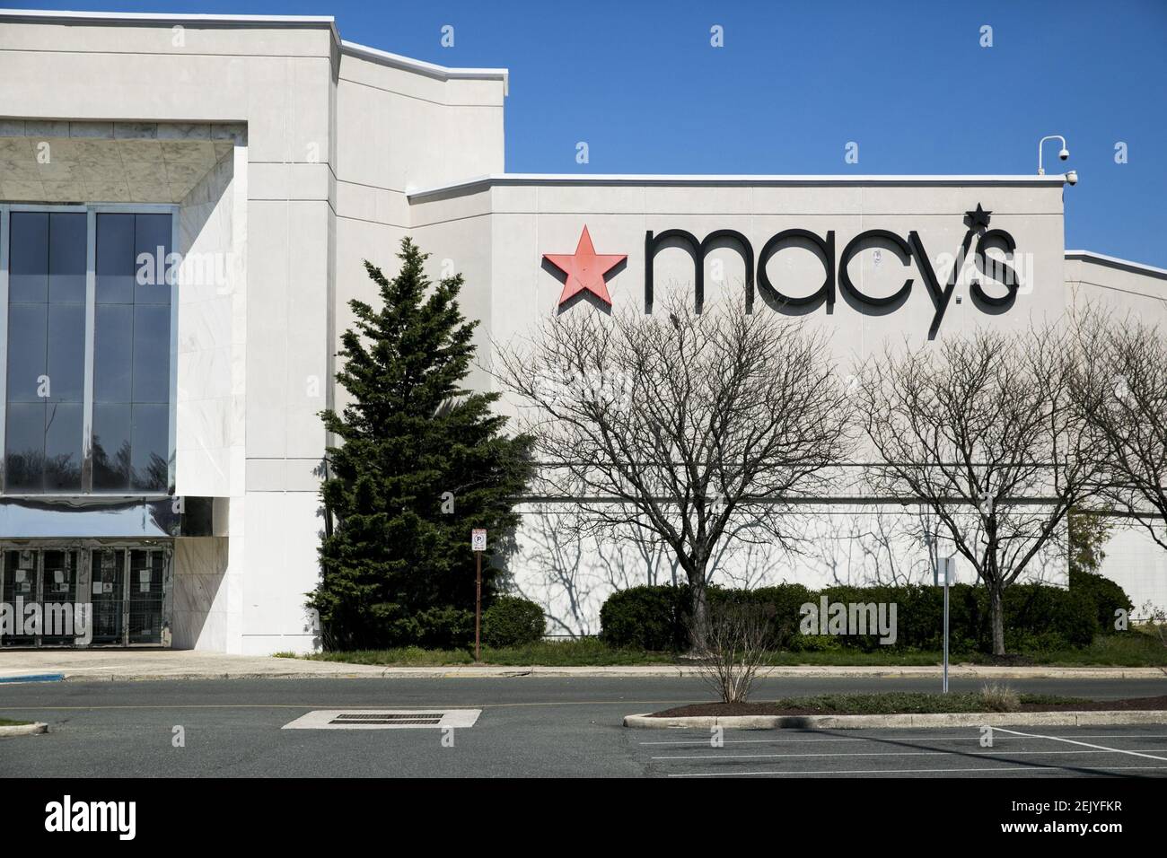 A logo sign outside of a Macy's retail store location in Baltimore ...