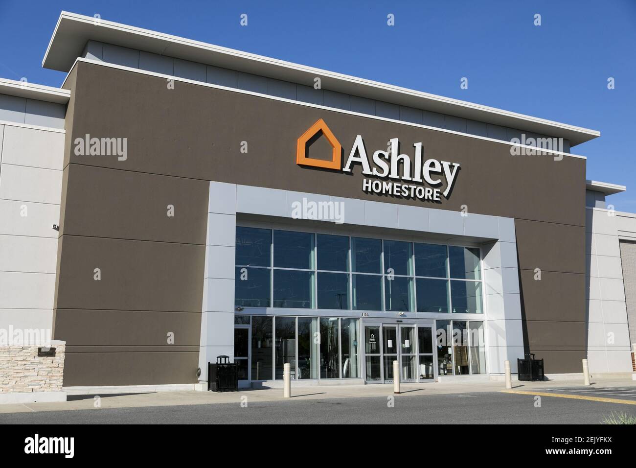 A logo sign outside of a Ashley HomeStore retail store location in ...