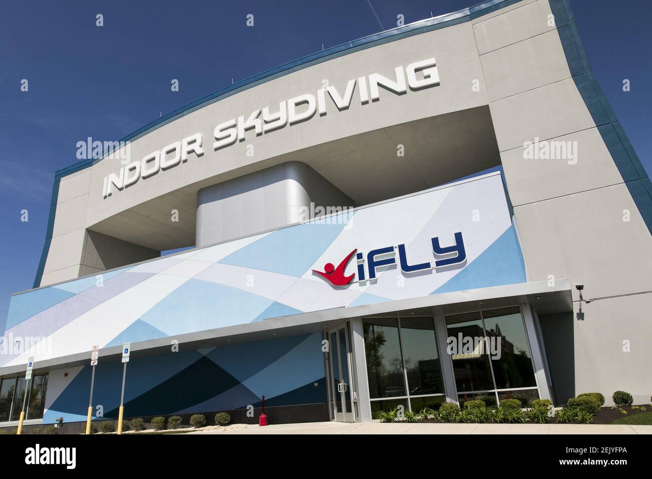 A logo sign outside of a iFly Indoor Skydiving location in Baltimore ...