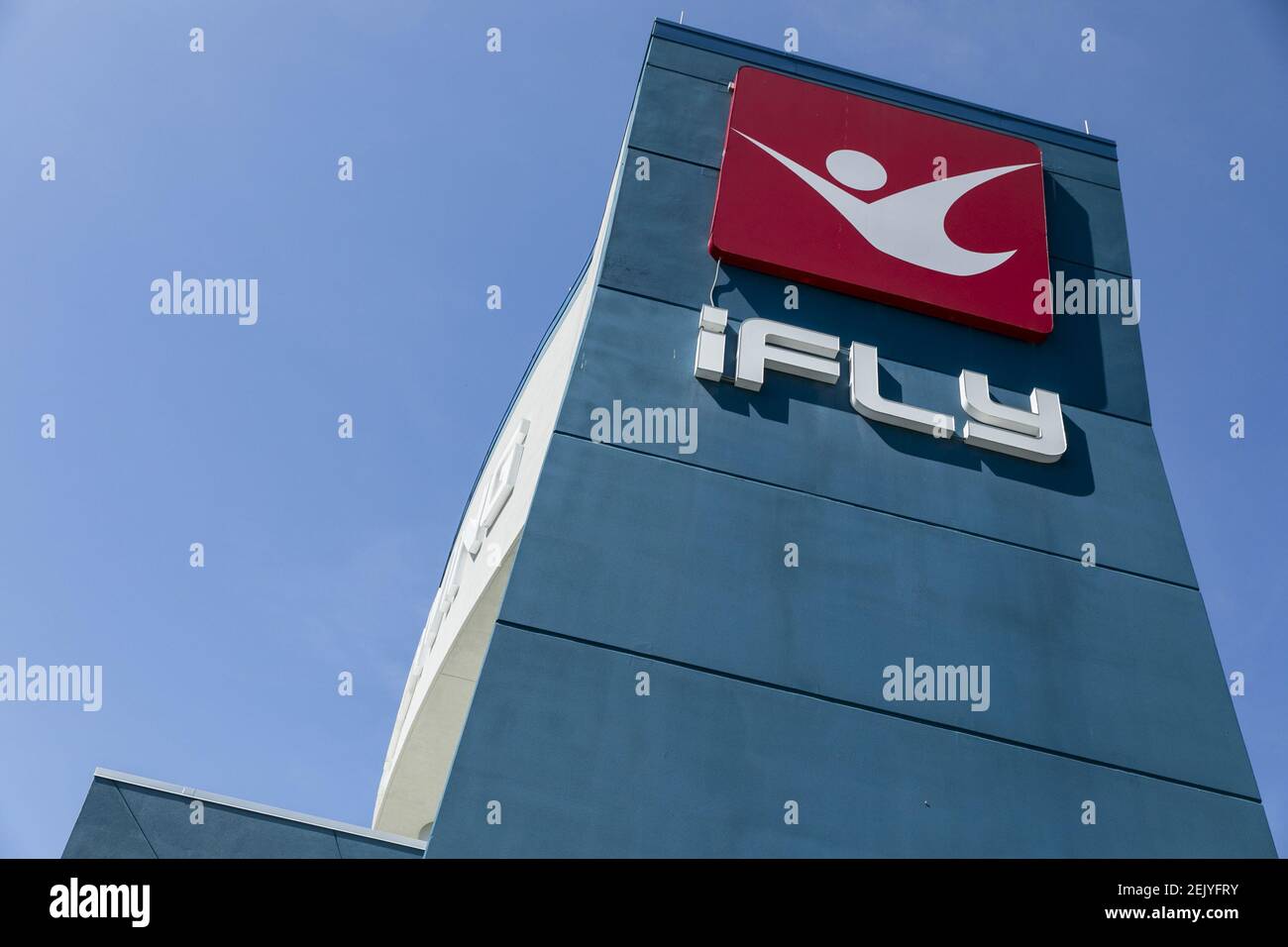 A logo sign outside of a iFly Indoor Skydiving location in Baltimore ...