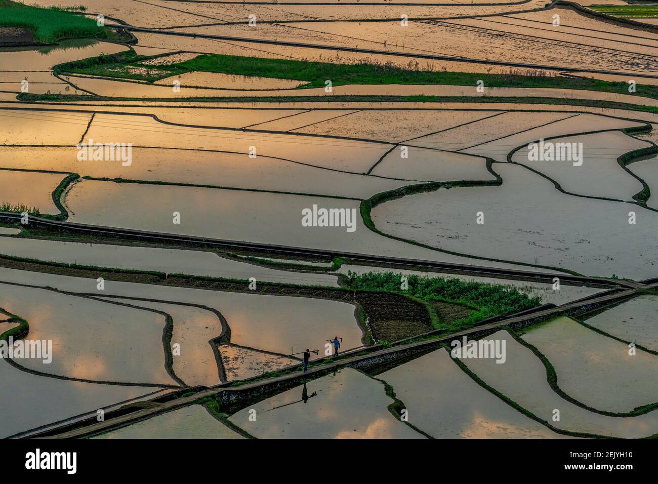 CHONGQING, CHINA - APRIL 9, 2020 - Villagers walk on a ridge in ...