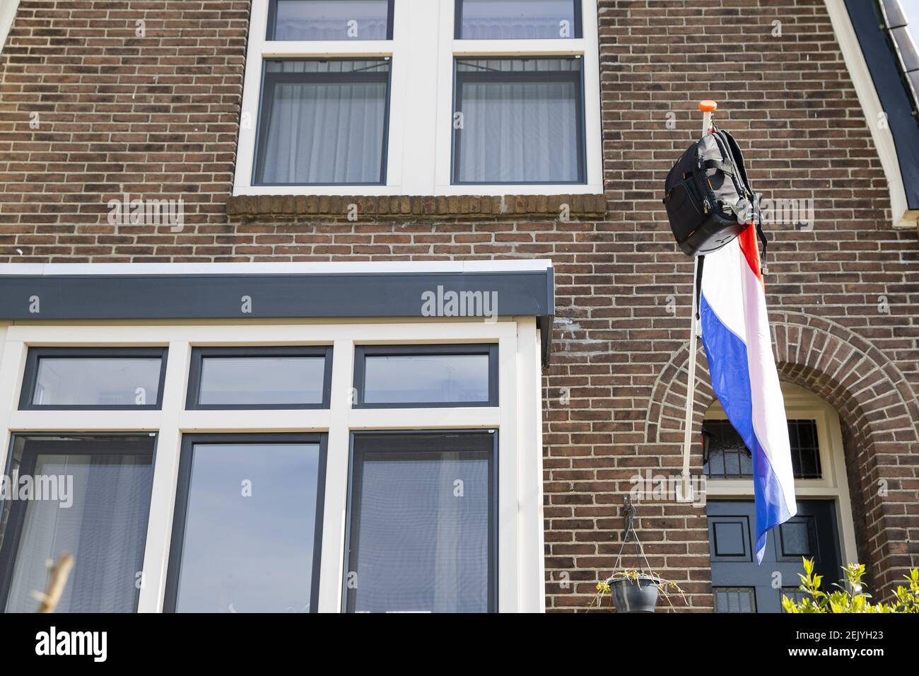 ALMELO,10-04-2020, Netherlands, Dutchnews, Dutch flag with bag ...