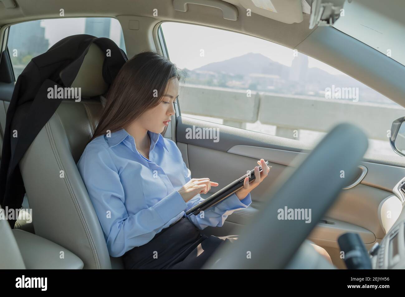 Asian girl inside car hi-res stock photography and images - Alamy