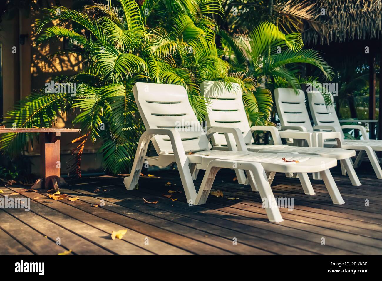 Lounge bed near pool terrace hi-res stock photography and images - Alamy