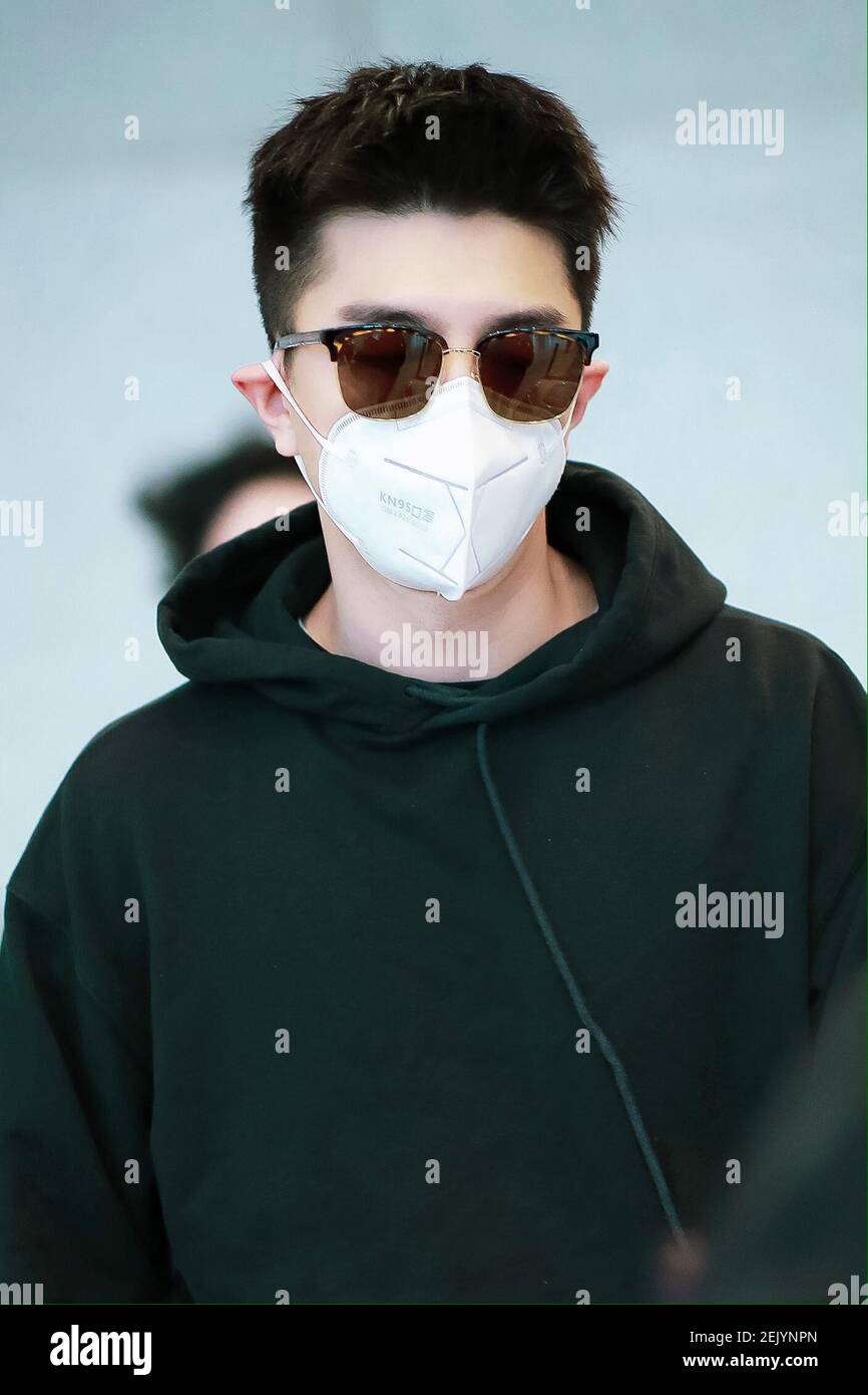 Chinese actor and singer Jin Han arrives at a Shanghai airport before ...