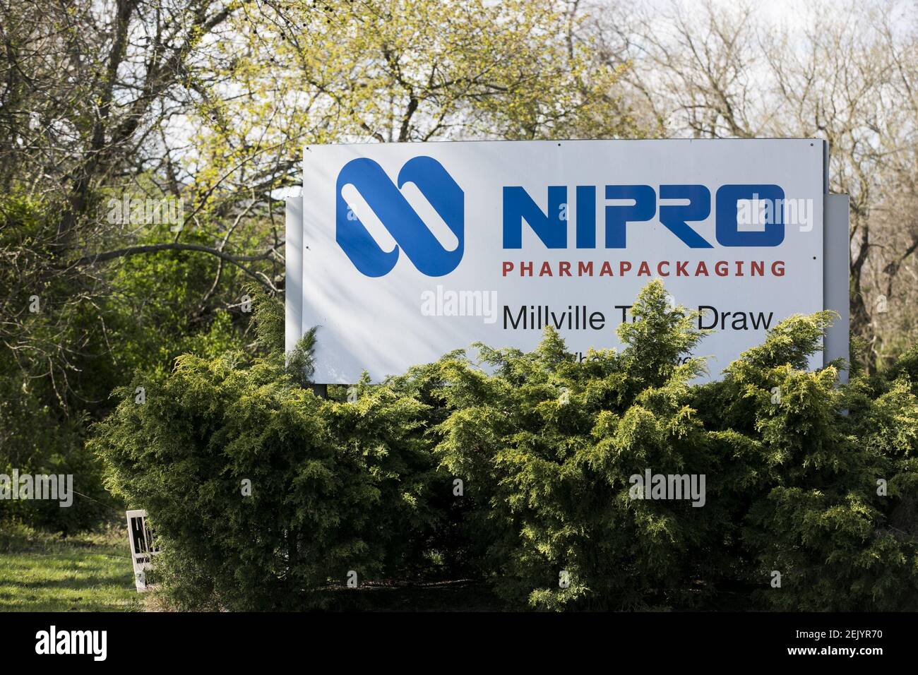 A logo sign outside of a facility occupied by Nipro Pharmapackaging in ...