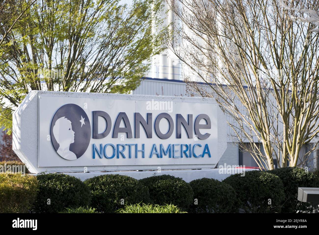 A logo sign outside of a facility occupied by Danone North America in ...