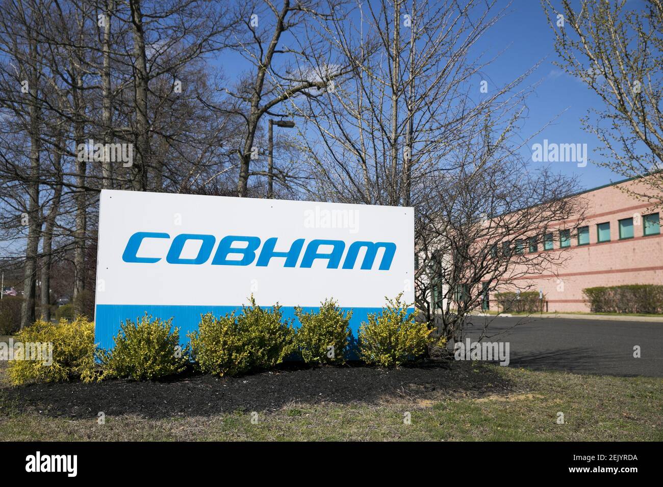 A logo sign outside of a facility occupied by Cobham in Eatontown, New ...