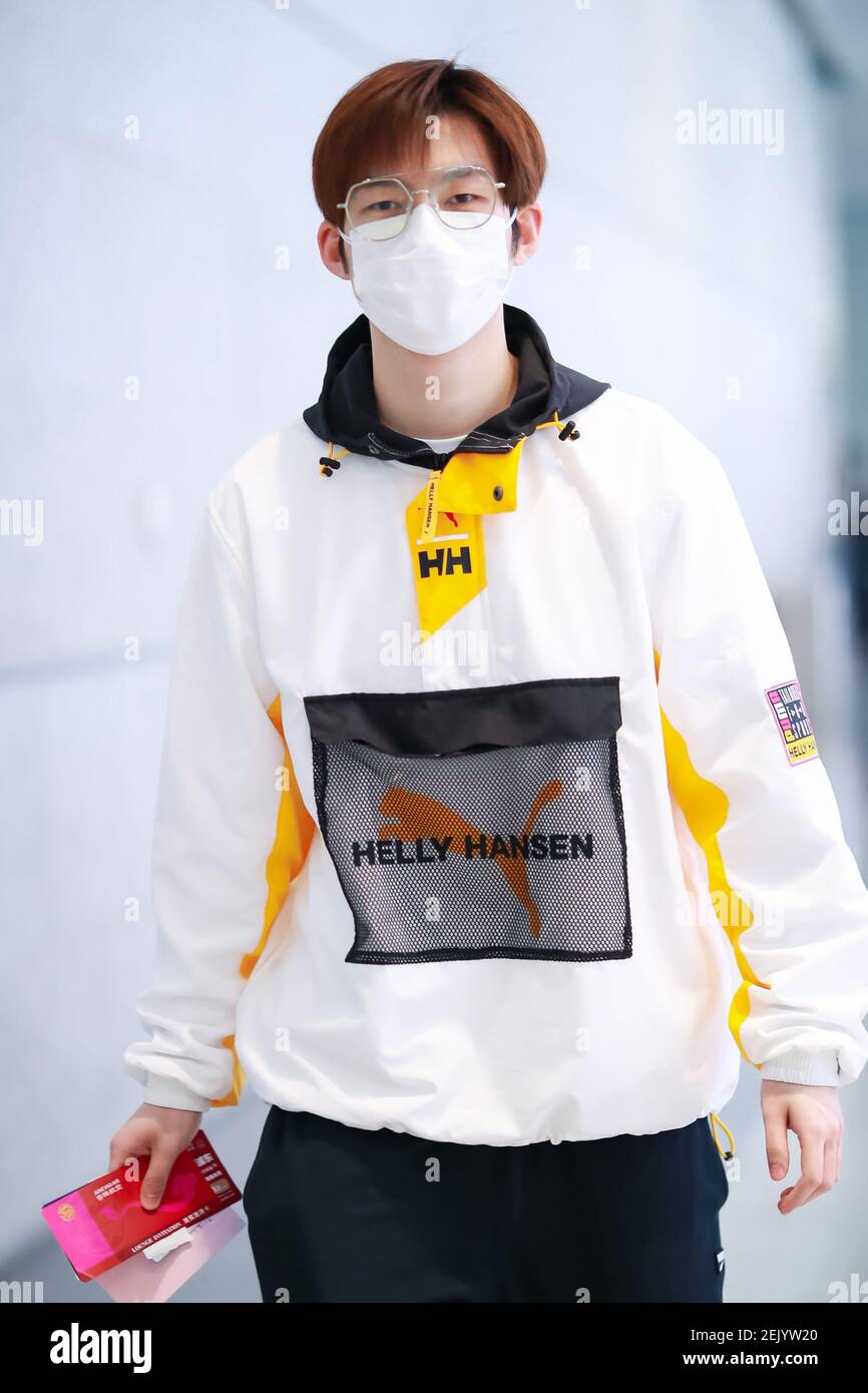 Chinese singer and actor Dong Li arrives at a Shanghai airport before ...