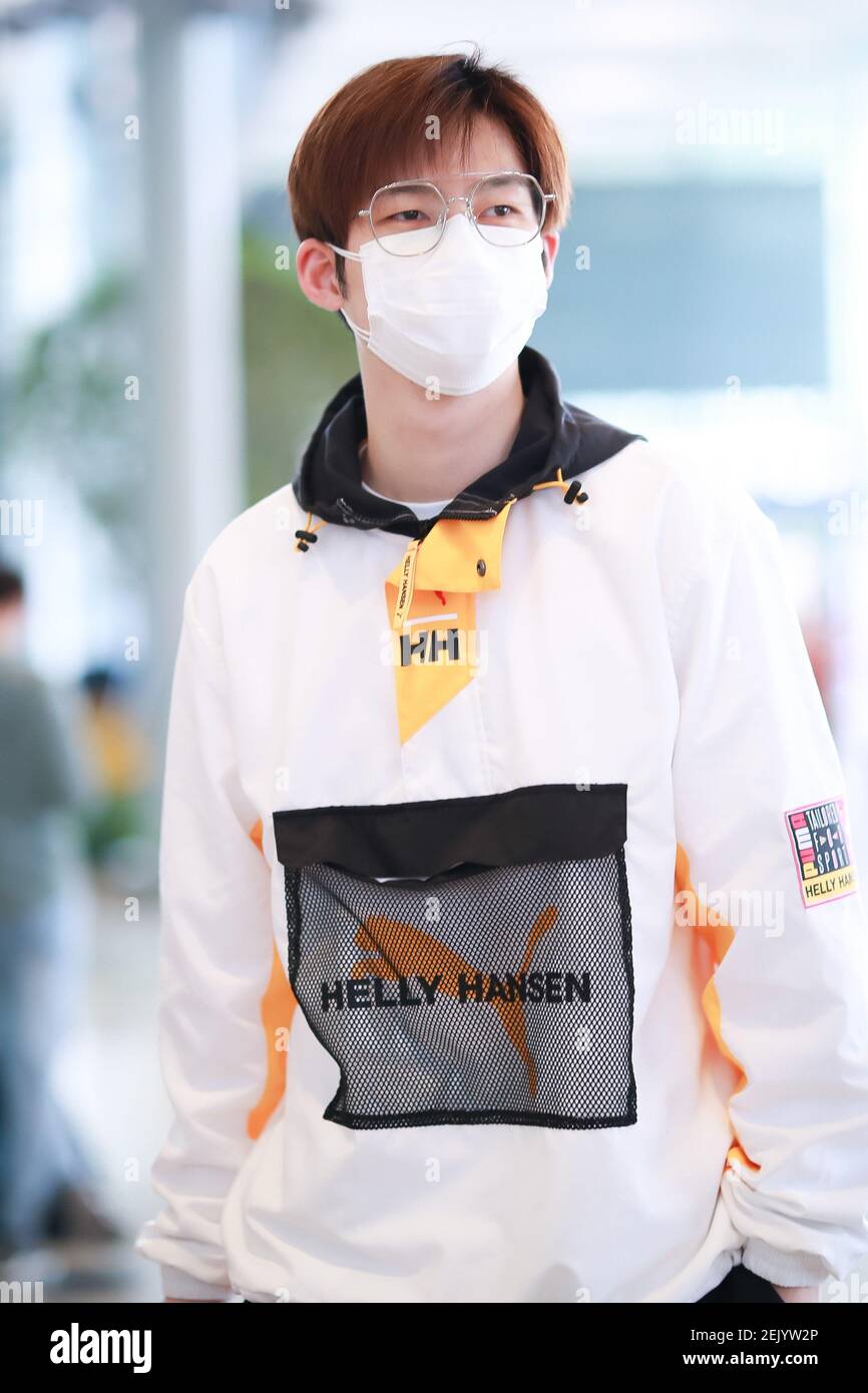 Chinese singer and actor Dong Li arrives at a Shanghai airport before ...