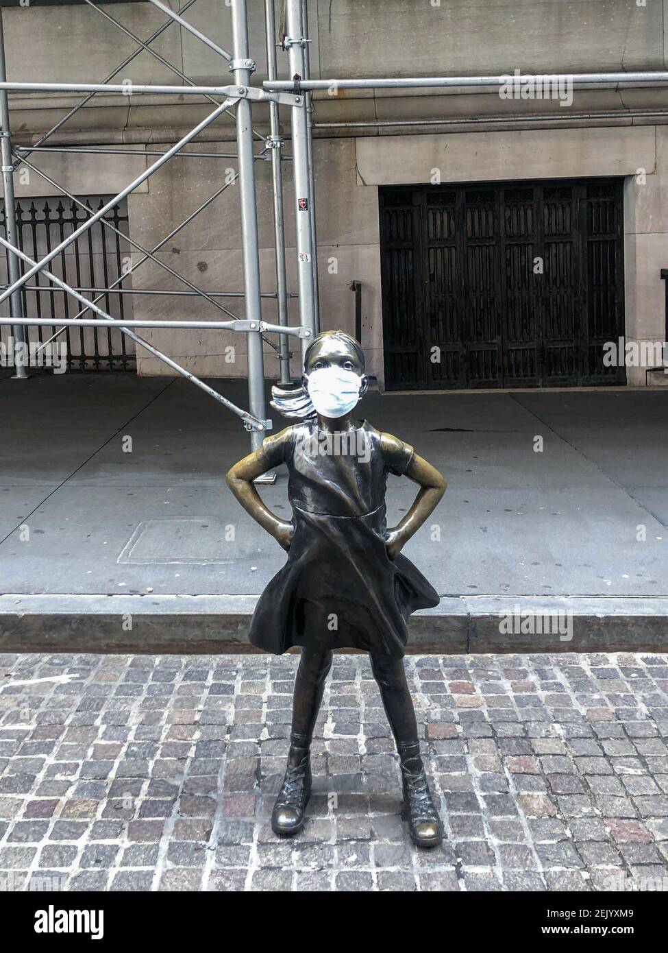 The Fearless Girl sculpture by Kristen Visbal is seen in front of the ...